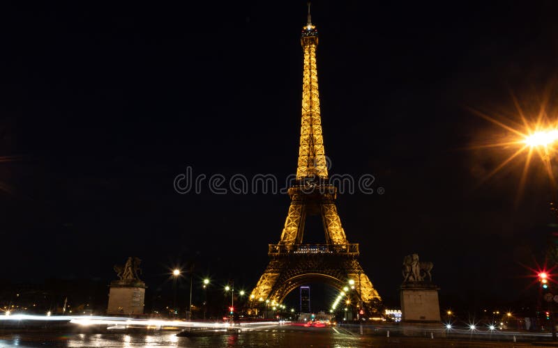 Eiffel Tower during the Night in Golden Lights Editorial Photography ...