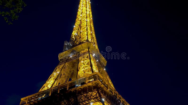 The Eiffel Tower at Night in Paris, France Stock Video - Video of ... The Eiffel Tower at Night in Paris, France Stock Video - Video of ...