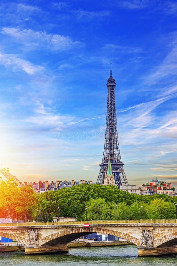 The Eiffel Tower in Paris Against the Backdrop of a Beautiful Sky ...