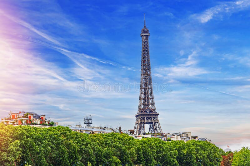 The Eiffel Tower in Paris Against the Backdrop of a Beautiful Sky ...