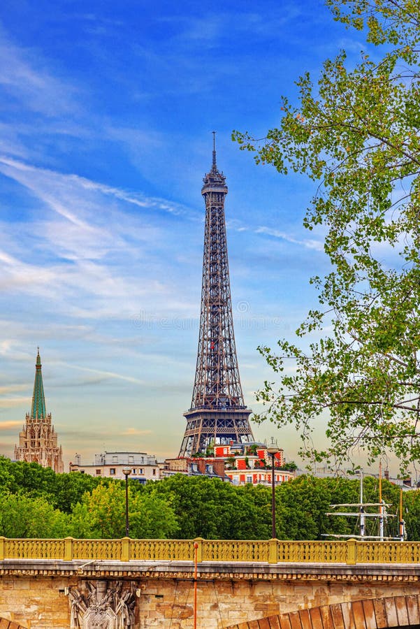 The Eiffel Tower in Paris Against the Backdrop of a Beautiful Sky ...