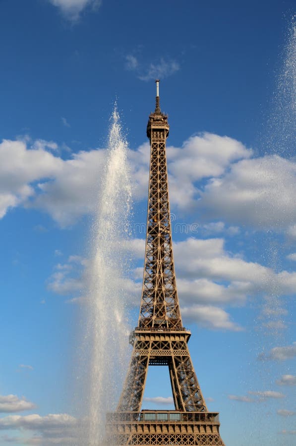 Eiffel Tower in Paris France with Clouds on the Sky Stock Photo - Image ... Eiffel Tower in Paris France with Clouds on the Sky Stock Photo - Image ...