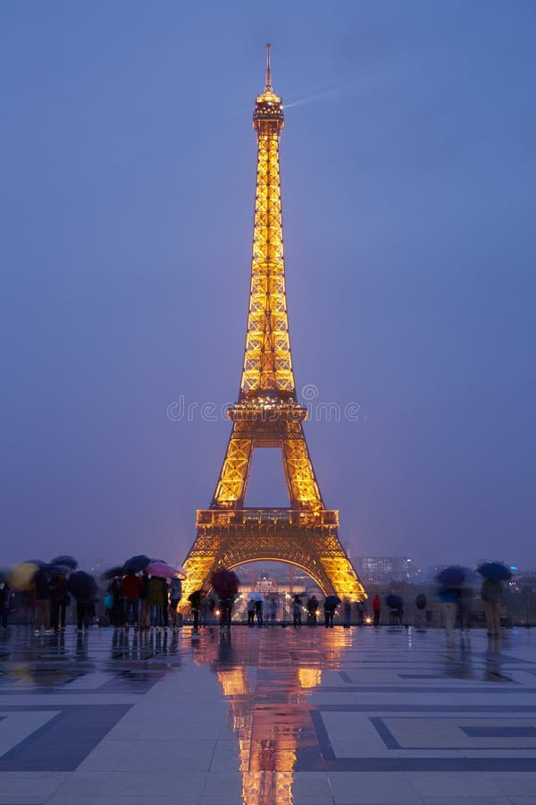 Eiffel Tower in Paris with Tourists at Dusk Editorial Stock Photo ...