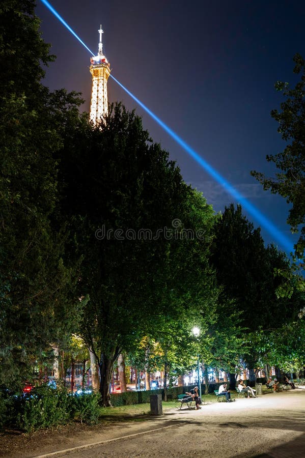 Eiffel Tower and Park at Night Editorial Photo - Image of spotlight ...