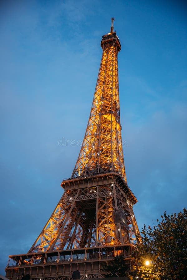 The Eiffel Tower Shine at Night. Beautiful Building at Night Editorial ...