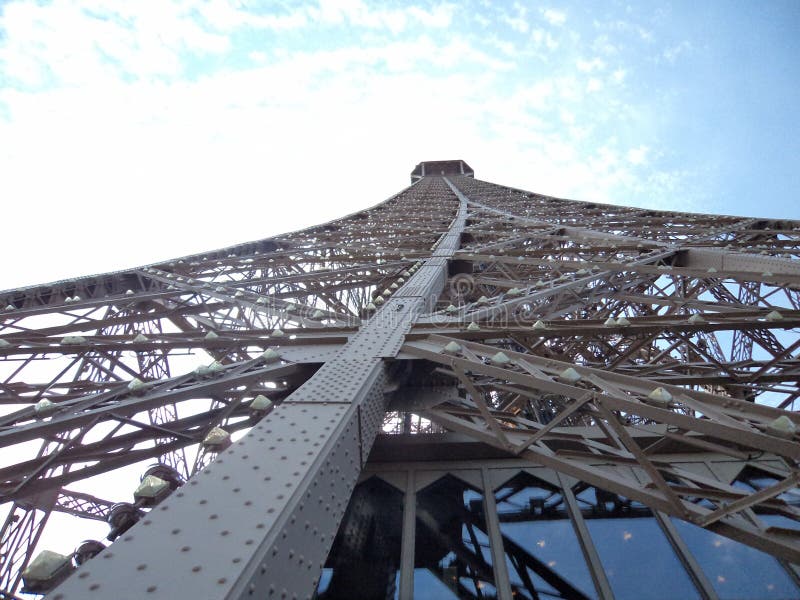 Eiffel Tower side view stock photo. Image of cloud, sunlight - 59468150