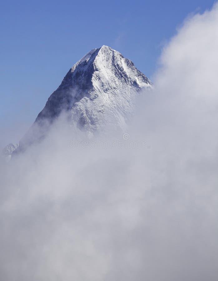 Eiger summit stock image. Image of mountains, clouds - 33372319
