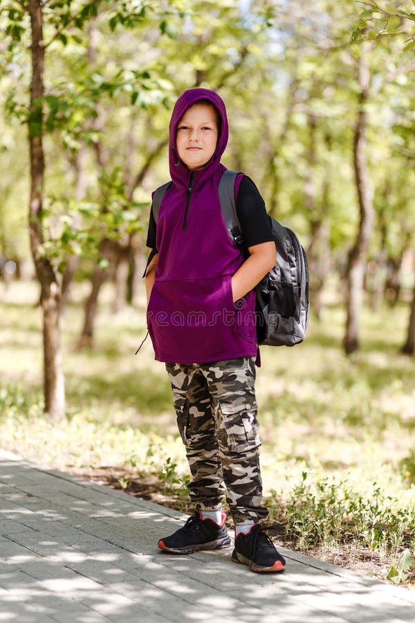 Schoolboy Boy with Large Backpack on His Back Stock Photo - Image of ...