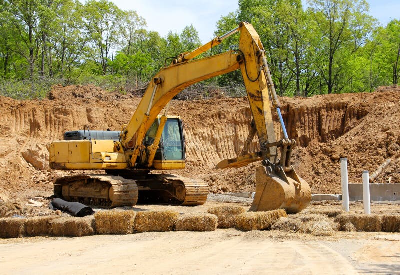 Ein Bagger Digs Ein Neues Loch in Der Erde Stockbild - Bild von graben ...