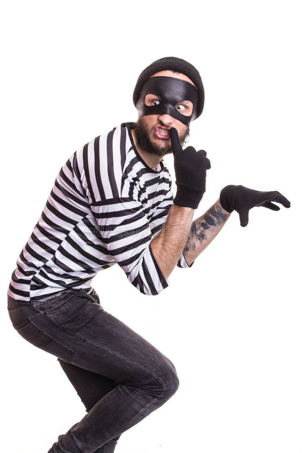 Ein Dieb Mit Der Ruhig Schleichenden Maske Stockfoto - Bild von ...