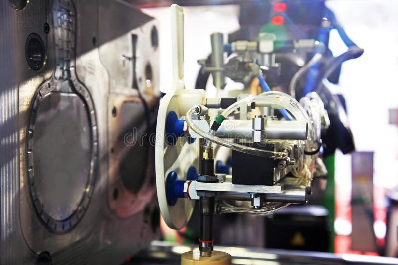 Automatic molding machine stock image. Image of working - 110569145