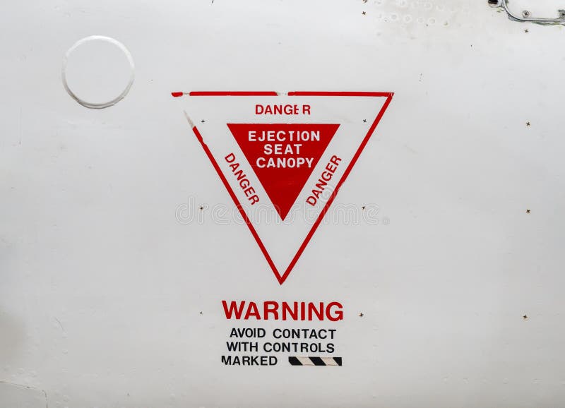 Ejection Seat Warning Sign on the Fuselage of an Old Aircraft Stock ...