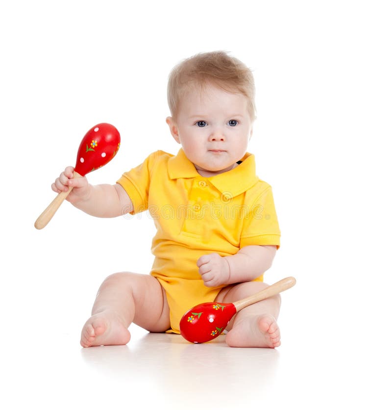 El Bebé Con Musical Juega Maracas Imagen de archivo - Imagen de sentada ...