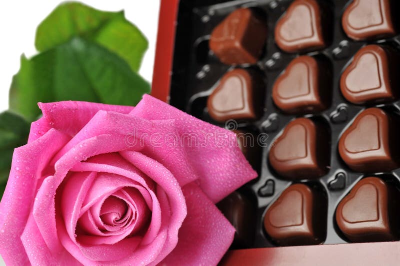 El Chocolate Y El Color De Rosa Se Levantaron Foto de archivo - Imagen ...