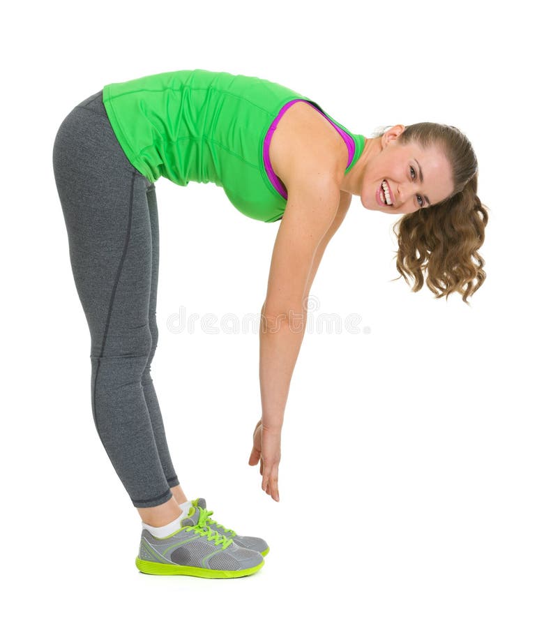 El Estirar Sano Sonriente De La Mujer Joven Foto de archivo - Imagen de ...