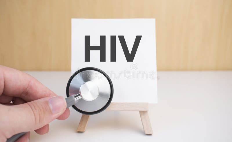 El Médico Sostiene Estetoscopio Y Comilía Con Vih De Texto Imagen de ...