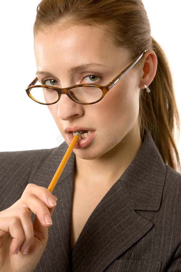 El morder en un lápiz foto de archivo. Imagen de mujer - 1889568