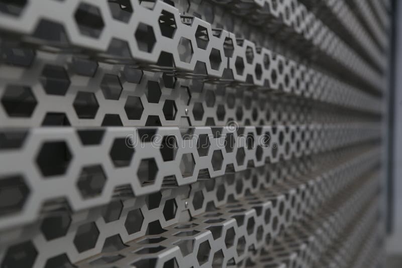 El Panel Perforado Del Metal Foto de archivo - Imagen de oscuro, fondo ...