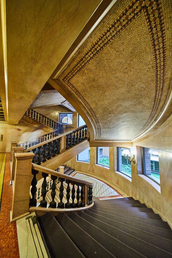Elaborate Winding Staircases with Multiple Levels and Curved Wall with ...