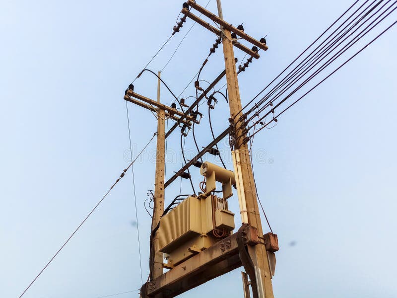 The Elactric Tower and Transformers on Blue Sky Background. Stock Image ...