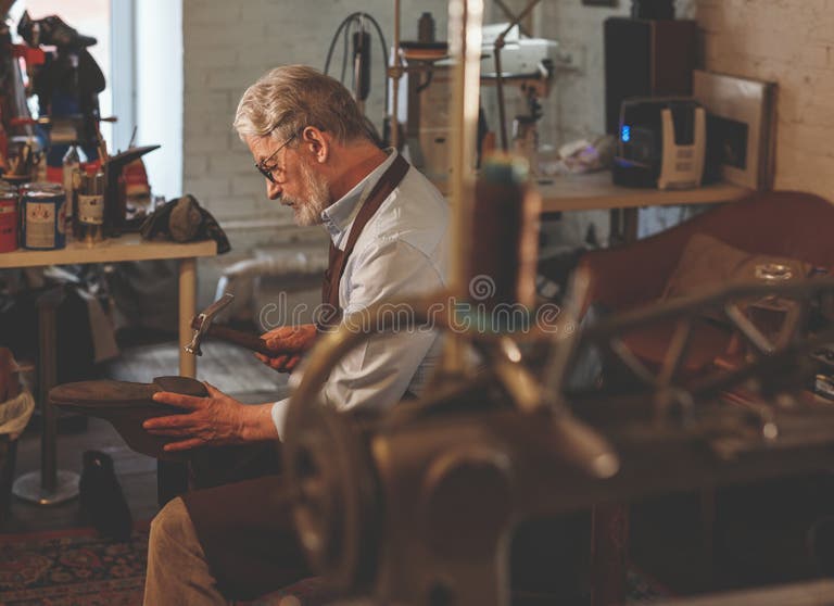 Elder cobbler at work stock image. Image of industry - 117868741