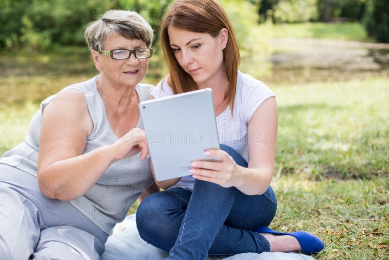 Elder lady is learning stock photo. Image of garden, happiness - 67663722