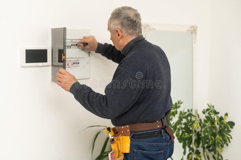 Elder Man Fixing an Electric Meter Stock Photo - Image of equipment ...