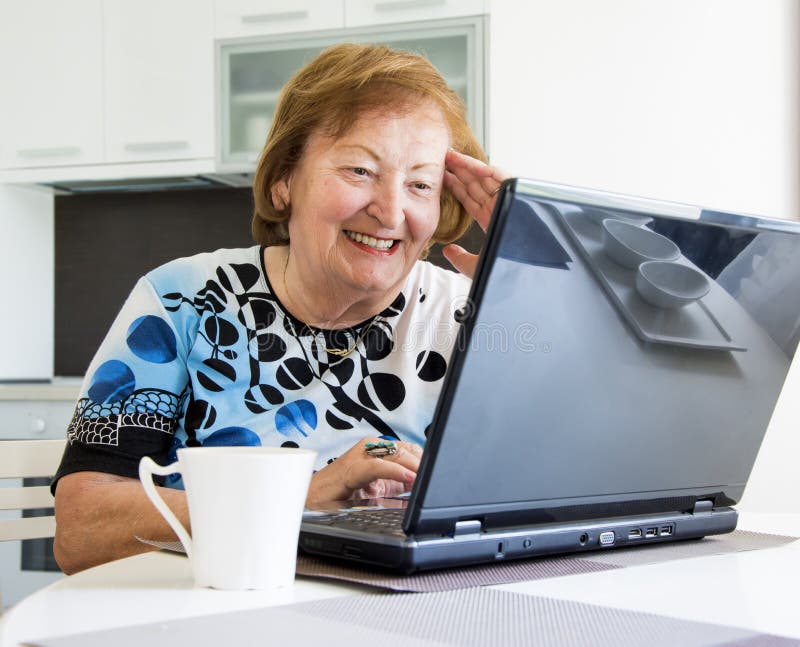 Elder Woman with a Computer Stock Photo - Image of internet, caucasian ...