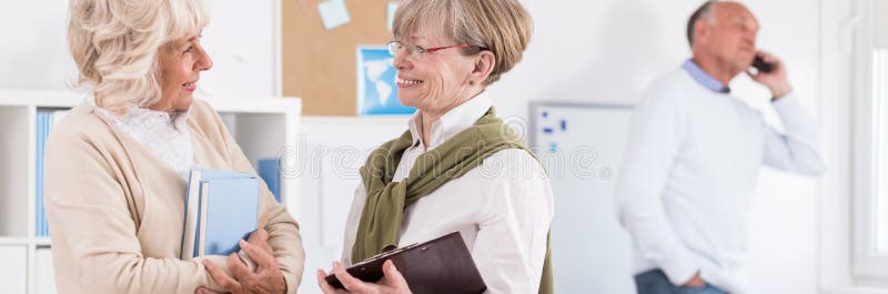 Elder women talking stock photo. Image of employee, female - 55250696