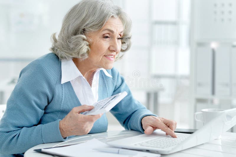 Elderly Businesswoman Working Stock Image - Image of looking ...