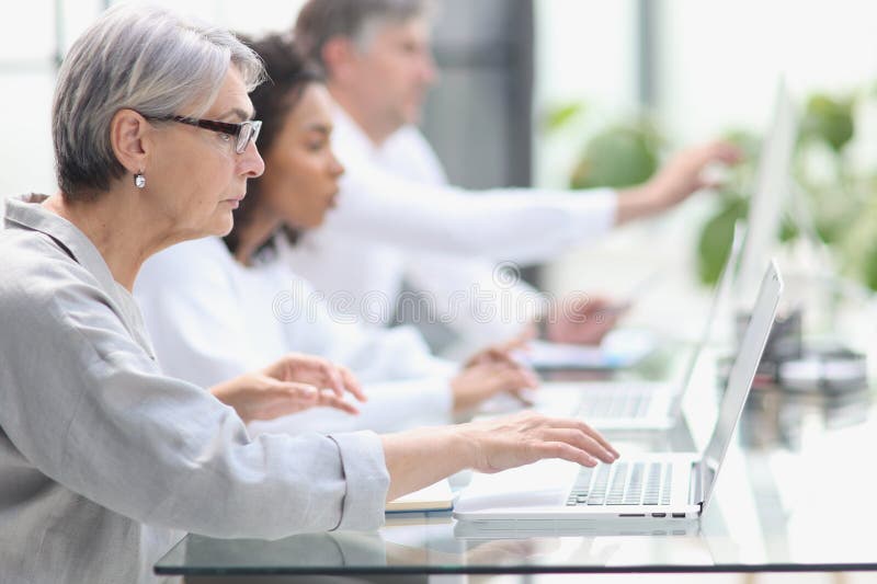 Elderly Call Center Employee at the Computer Stock Photo - Image of ...