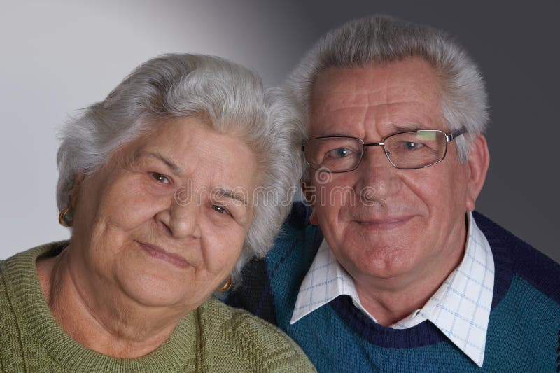 Elderly couple posing stock image. Image of female, glasses - 5556435