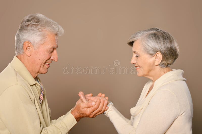 Elderly Couple Holding Hands Stock Photo - Image of people, hand: 36660944