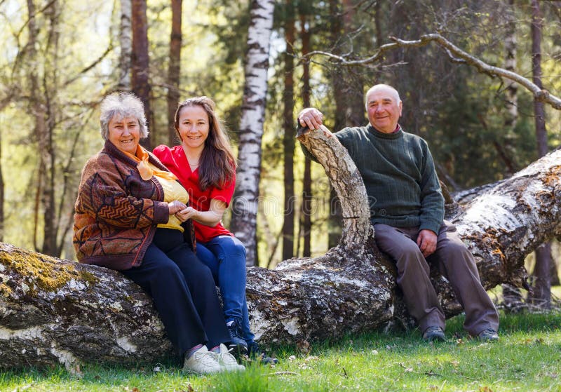 Elderly Couple and Young Caregiver Stock Image - Image of ageing, happy ...