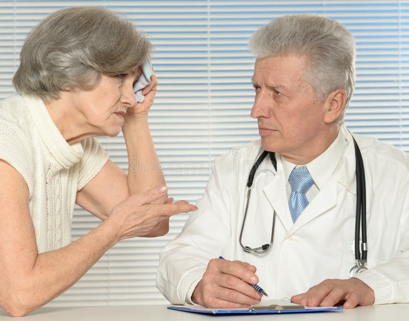 Elderly Doctor with Patient Stock Image - Image of caucasian, female ...