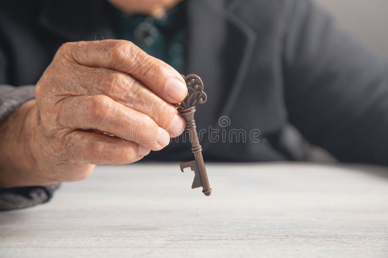 Elderly Female Hand with a Old Key Stock Image - Image of retired ...