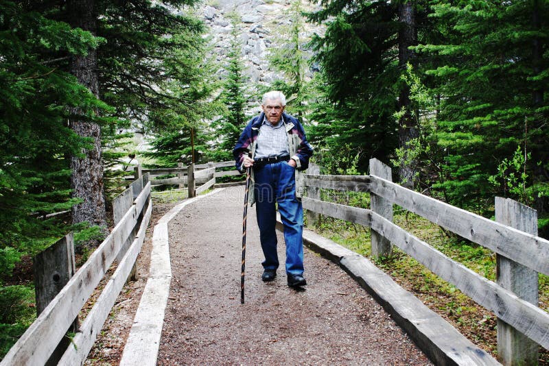 Elderly Gentleman Hiking on a Trail Stock Image - Image of landscape ...