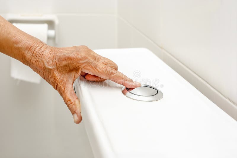 Elderly Hand Pressing Toilet Flush Button Stock Image - Image of ...