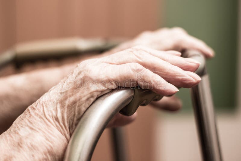 Elderly hands on a walker stock image. Image of arthritis - 92150331