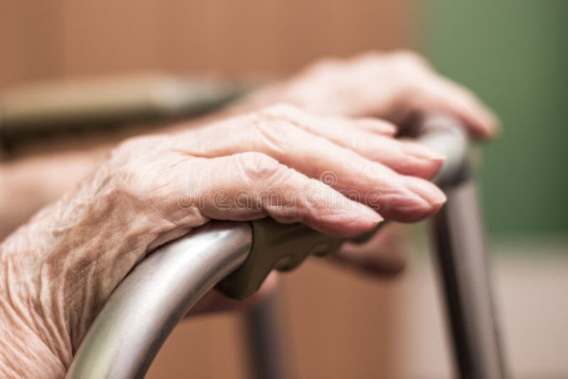 Elderly hands on a walker stock photo. Image of females - 92150334