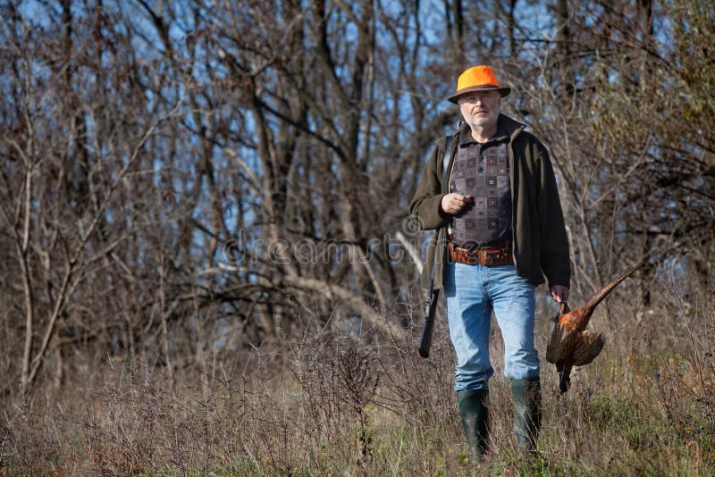 Elderly Hunter with Wildfowl in Orange Hat Stock Image - Image of ...