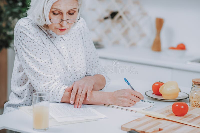 Mature Woman is Creating Food Recipes at Home Stock Image - Image of ...