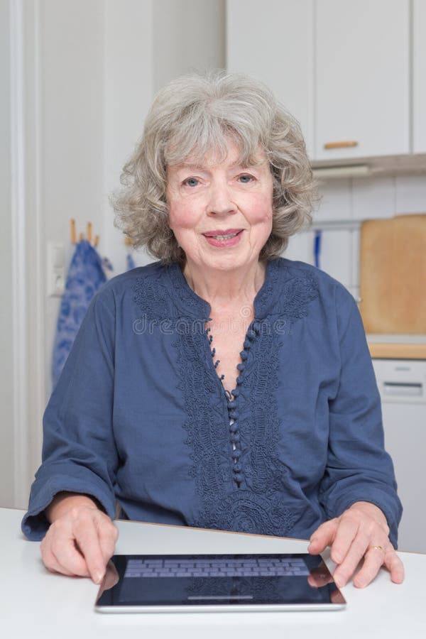 Elderly Lady with Tablet Computer Stock Photo - Image of elderly, email ...