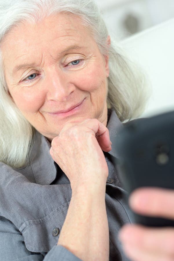 Elderly Lady Using Smartphone Stock Image - Image of smiling, grey ...