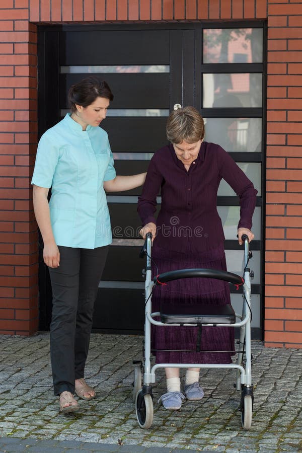 Elderly lady with walker stock photo. Image of elderly - 42126982
