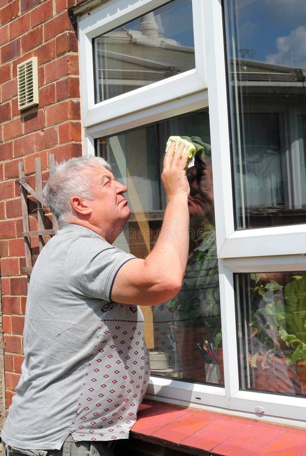 Elderly Man Washing or Cleaning Windows. Stock Image - Image of cloth ...