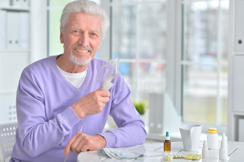 Old man doing inhalation stock image. Image of oxygen - 30174371