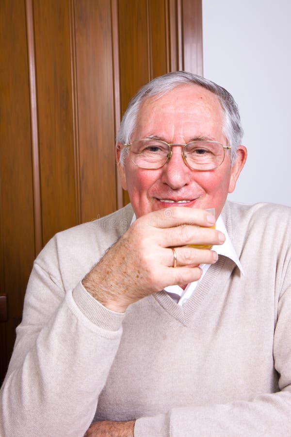 Elderly Man With A Drink Stock Image Image Of Retirement 27909607