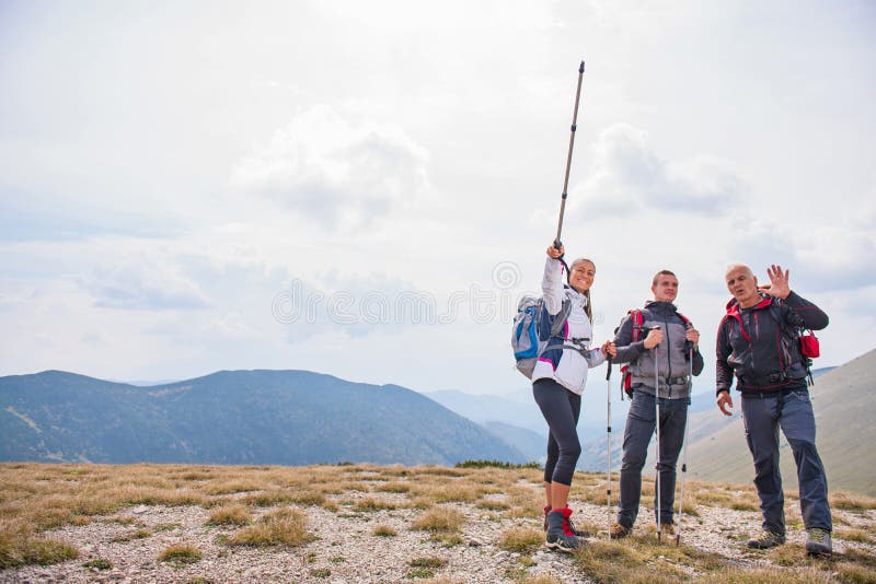 An Elderly Man Giving a Tour for a Young Group of People Stock Image ...