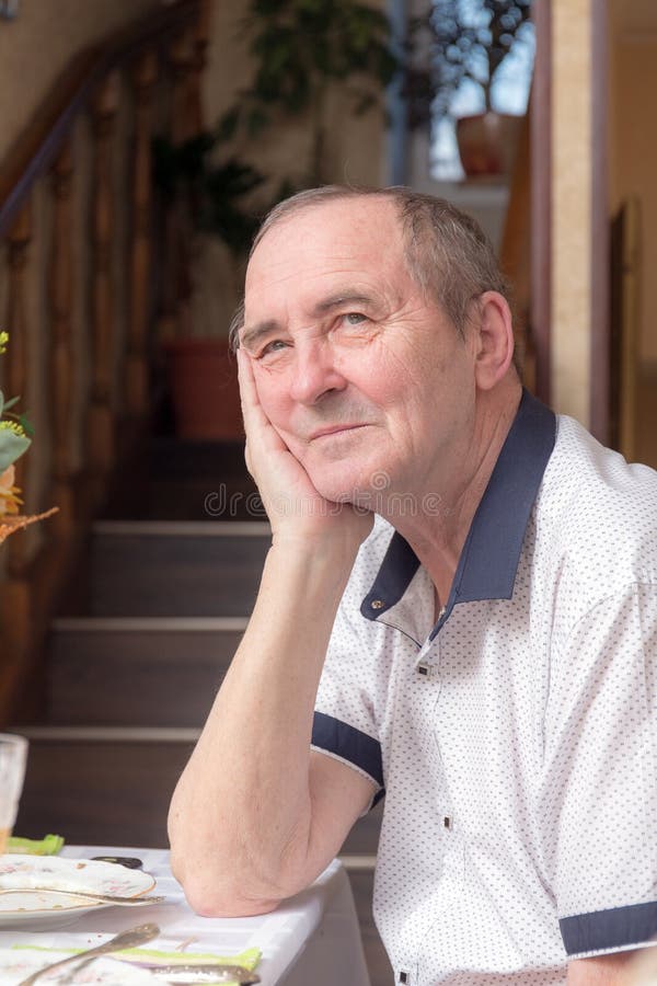 Elderly man at home stock photo. Image of indoor, table - 105991522